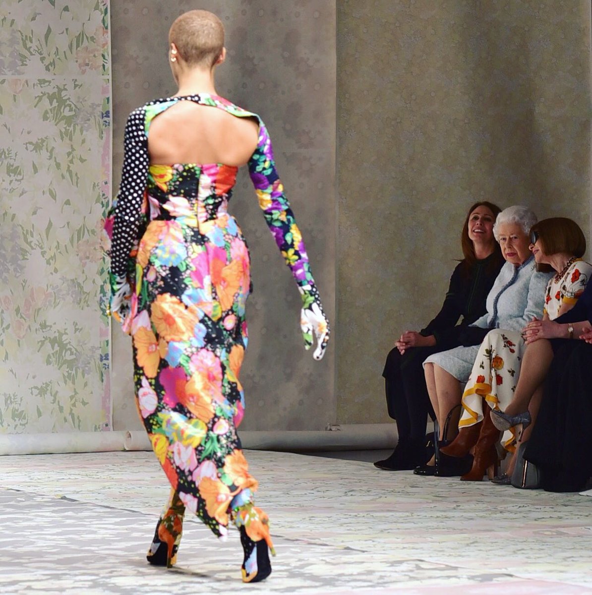 The Queen sits front row at Richard Quinn as designer receives ...