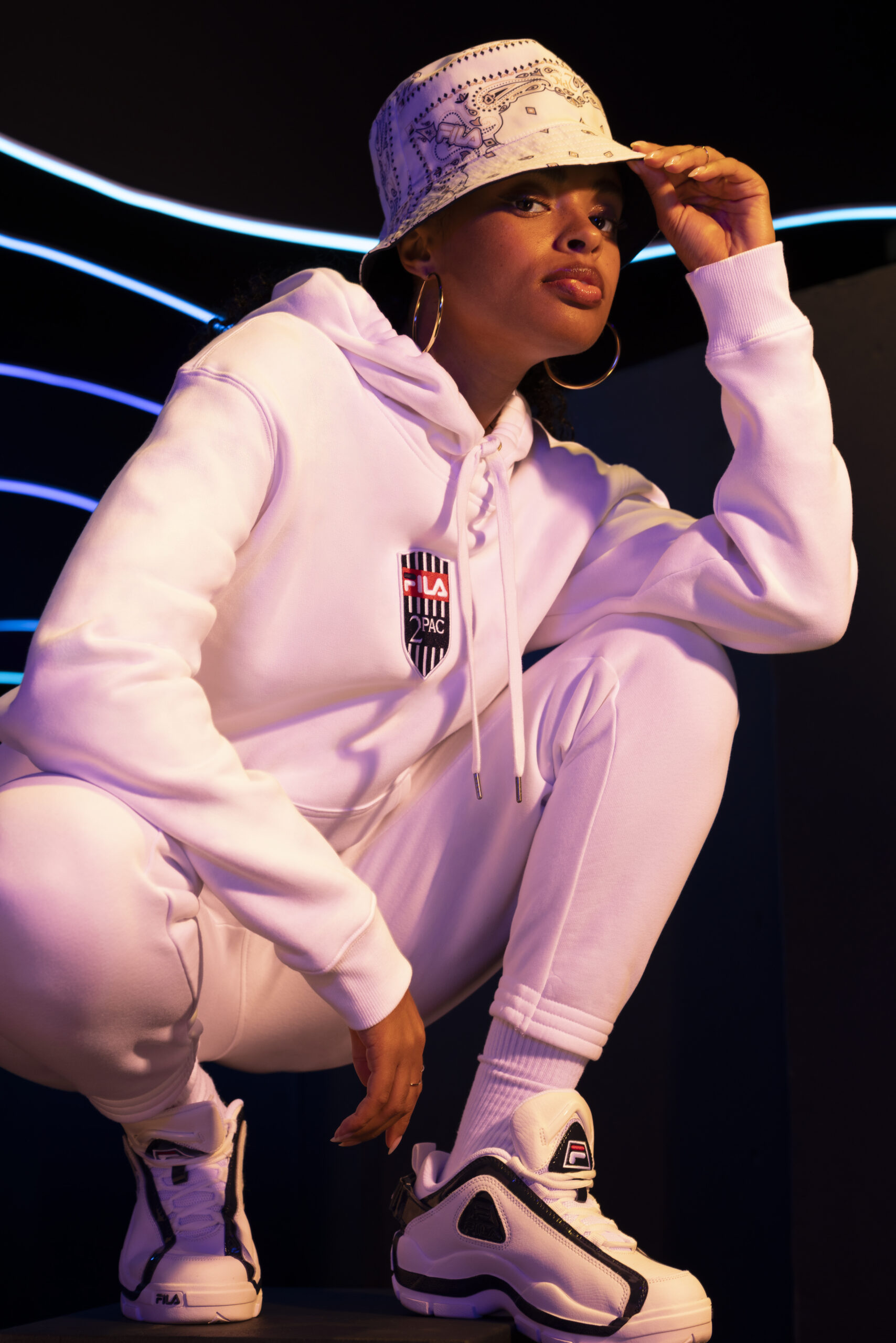 New Fila x 2Pac collection pays homage to late rapper’s 90s style ...